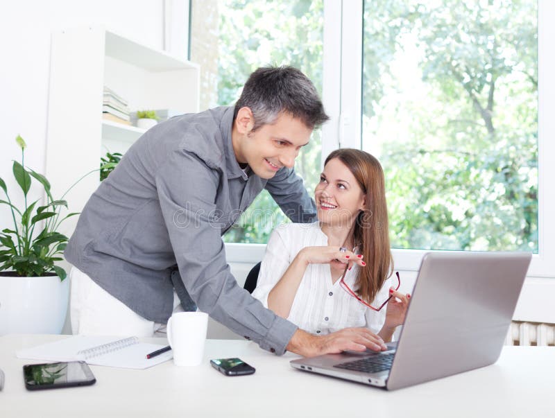 Teamwork stock image. Image of laptop, married, cheerful - 57406057