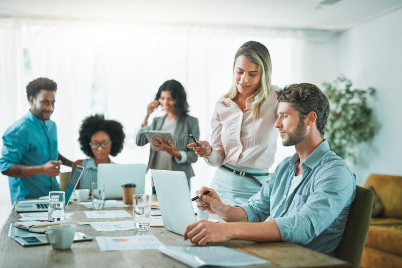 Teamwork is always Better. Young Designers Working in a Modern Office ...