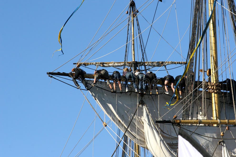 Teamwork on boat stock image. Image of folding, sails, sail - 214381