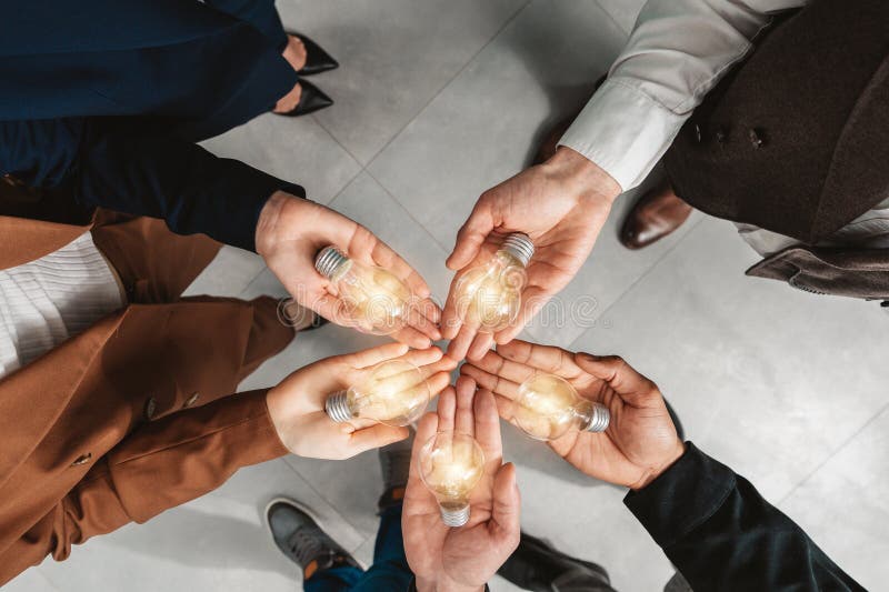 Teamwork and Brainstorming Concept with Businessmen that Share an Idea ...