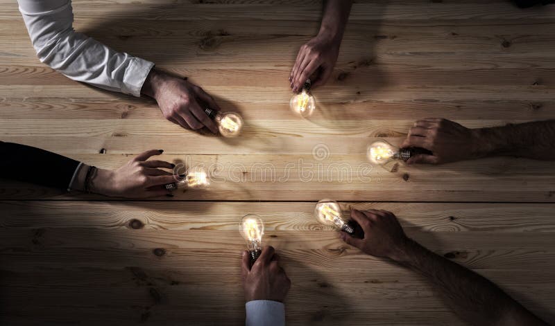 Teamwork and Brainstorming Concept with Businessmen that Share an Idea ...