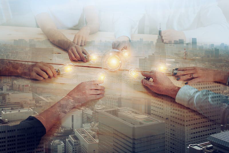 Teamwork and Brainstorming Concept with Businesspeople that Share an ...