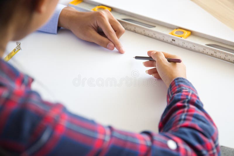 Architect Work Concept. Close Up Hand of Architect Writing on the ...