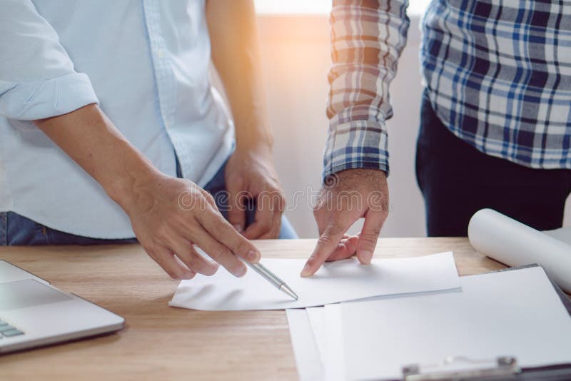 Teamwork of Business Start Up Working Together. Two Businessmen ...