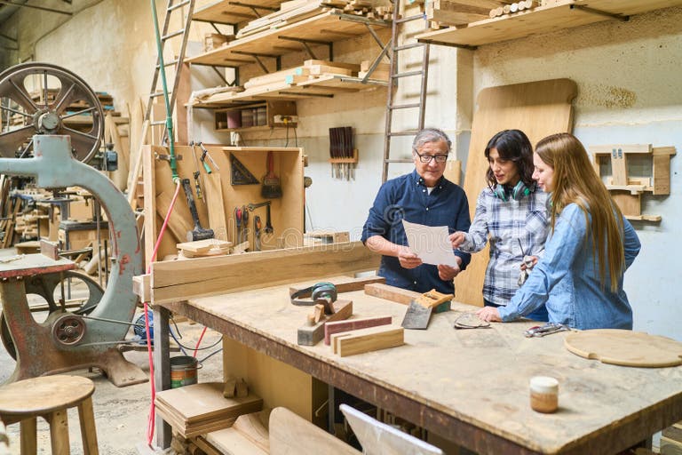 Teamwork in a Busy Lumberyard with Collaborative Woodworking Efforts Stock Photo - Image of ...