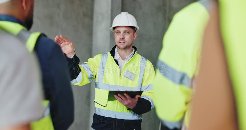 Teamwork, Checklist and Inspection with Man on Construction Site for ...