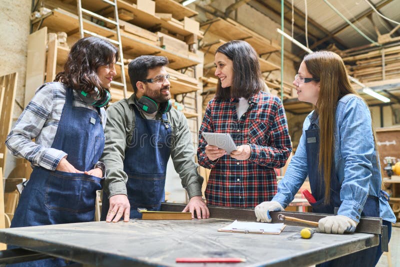 Teamwork and Collaboration in a Busy Lumberyard Workshop Stock Image ...
