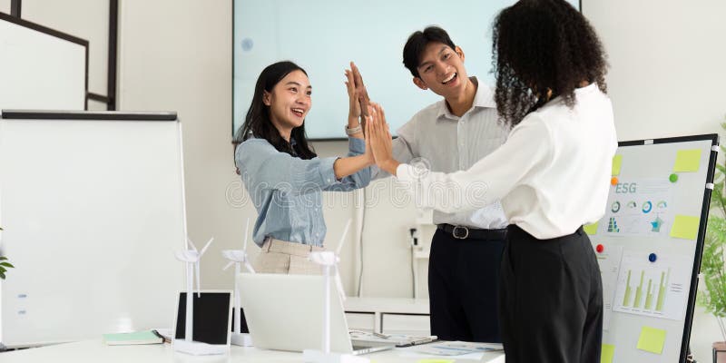 Teamwork and Collaboration. Three Colleagues Engaging in a High-energy ...