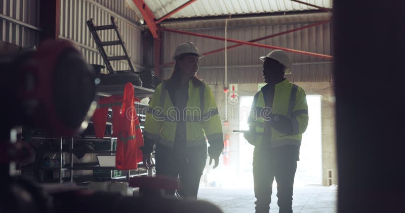 Teamwork, Construction or People in a Warehouse Talking for Development ...