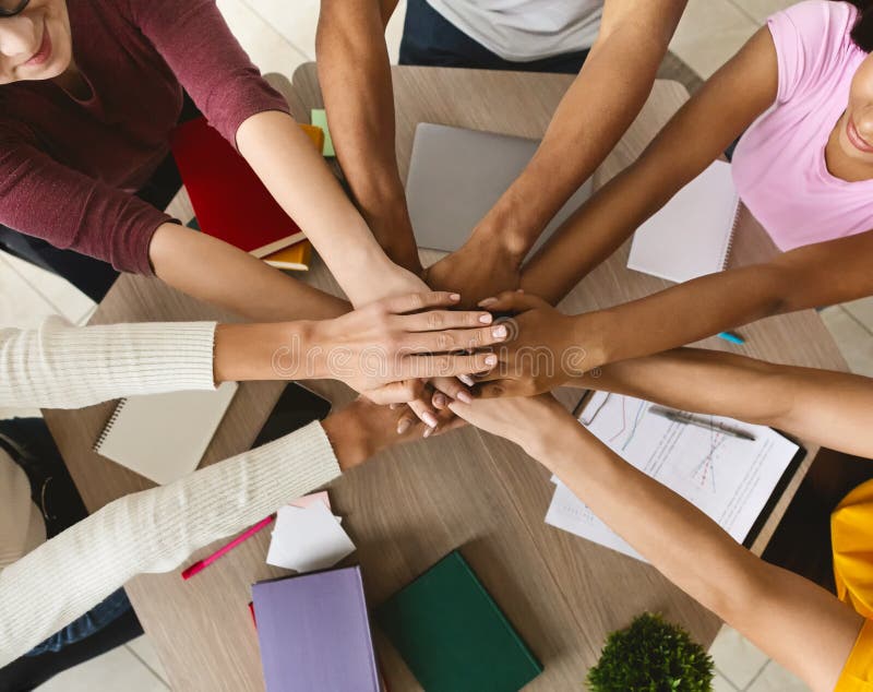 Multiracial Teenagers Joining Hands Together Cooperation Stock Photos ...