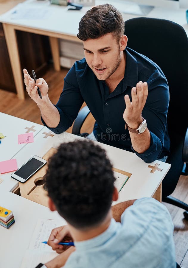 Teamwork is at the Core of a Successful Business. Two Young Businessmen ...