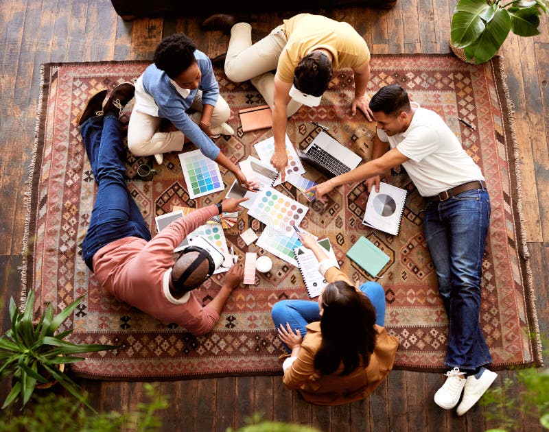 Teamwork, Creative and Overhead with a Designer Team Lying on the Floor ...