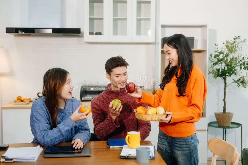 Teamwork and Creativity with Sitting Working at Kitchen Table Young ...