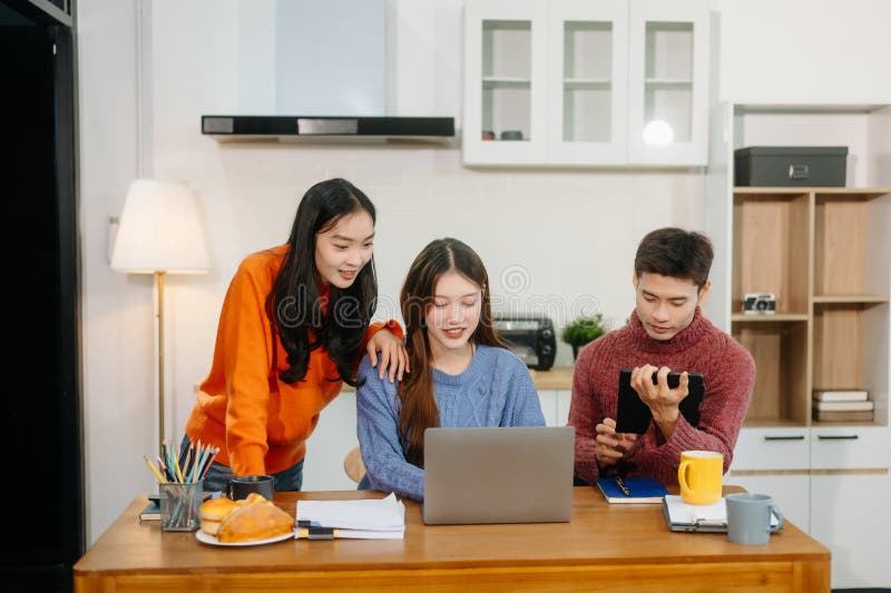 Teamwork and Creativity with Sitting Working at Kitchen Table Young ...