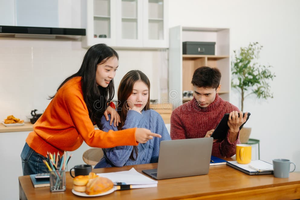 Teamwork and Creativity with Sitting Working at Kitchen Table Young ...