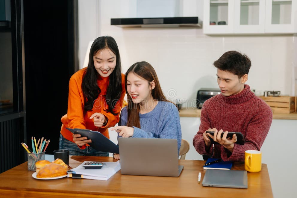 Teamwork and Creativity with Sitting Working at Kitchen Table Young ...