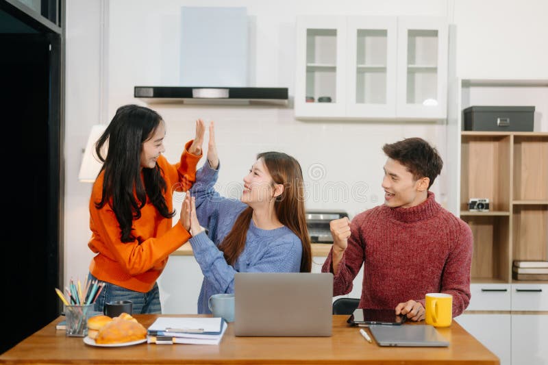 Teamwork and Creativity with Sitting Working at Kitchen Table Young ...