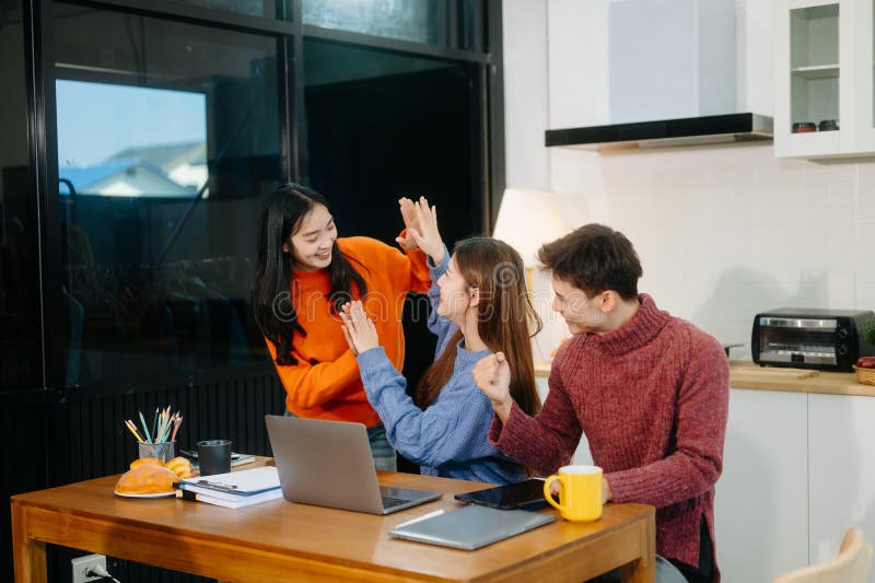 Teamwork and Creativity with Sitting Working at Kitchen Table Young ...