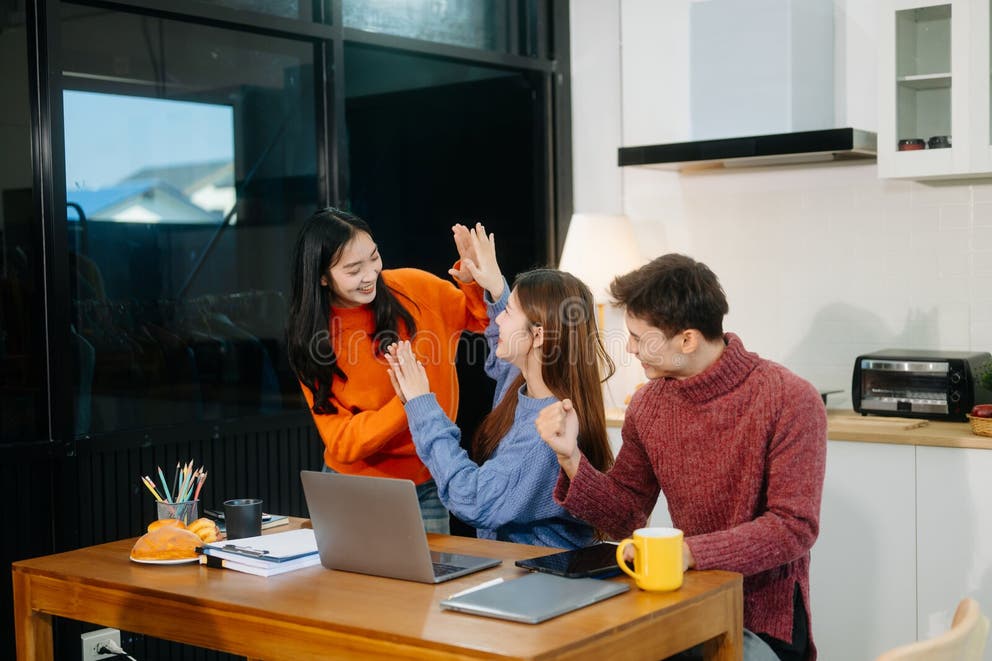 Teamwork and Creativity with Sitting Working at Kitchen Table Young ...