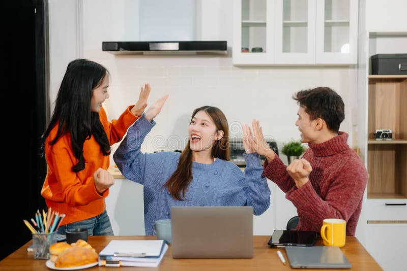 Teamwork and Creativity with Sitting Working at Kitchen Table Young ...