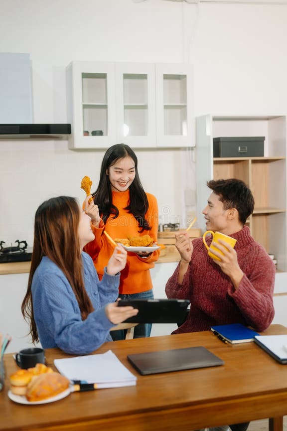 Teamwork and Creativity with Sitting Working at Kitchen Table Young ...