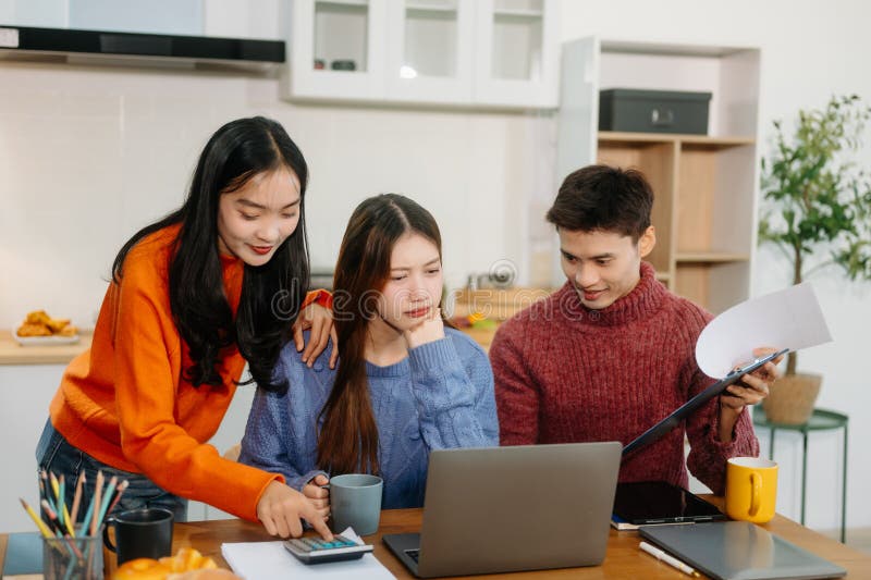 Teamwork and Creativity with Sitting Working at Kitchen Table Young ...