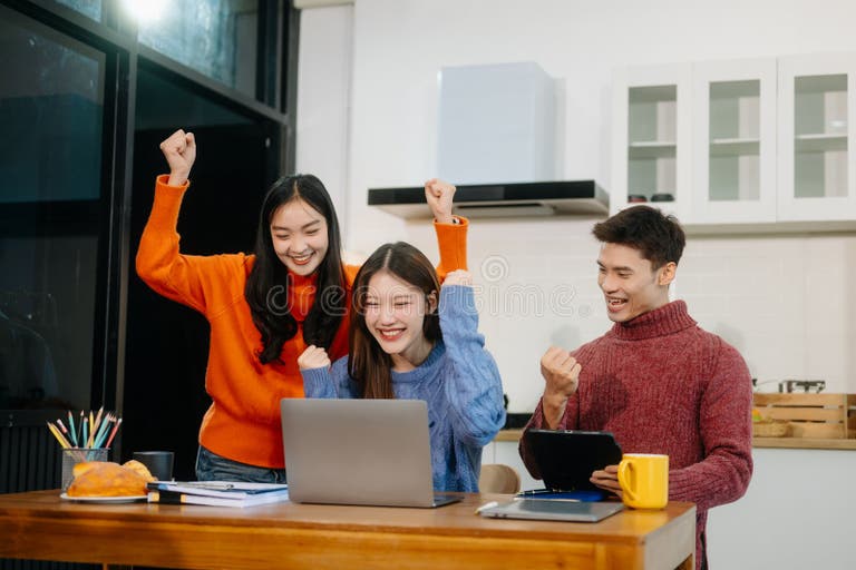 Teamwork and Creativity with Sitting Working at Kitchen Table Young ...