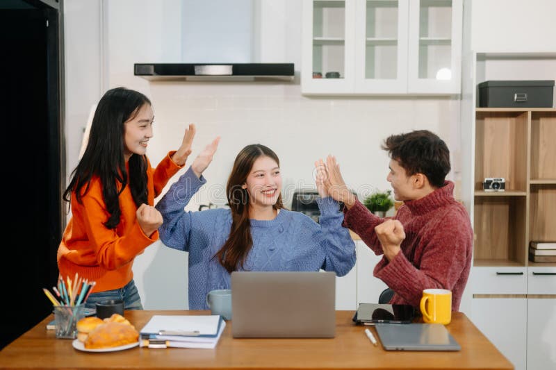 Teamwork and Creativity with Sitting Working at Kitchen Table Young ...