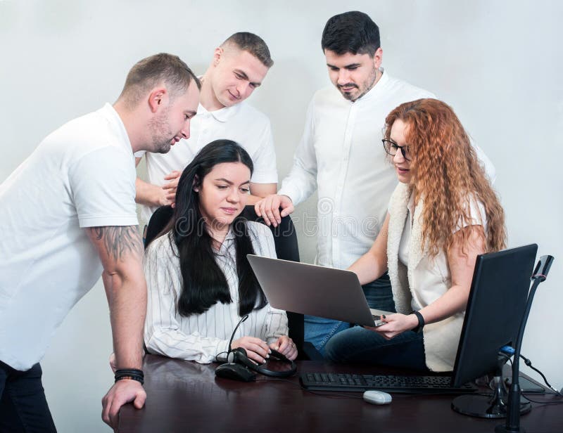 Teamwork Discussion, Young People Working with Laptop Stock Photo ...