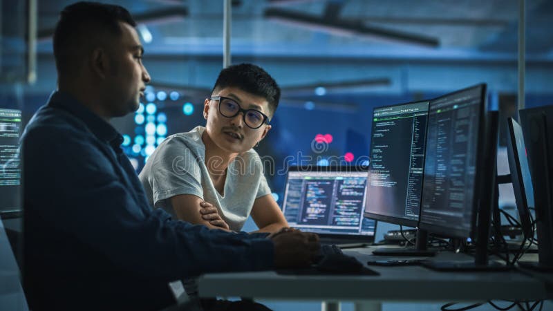 In the Office Businessman and Businesswoman Sitting Opposite To Stock ...