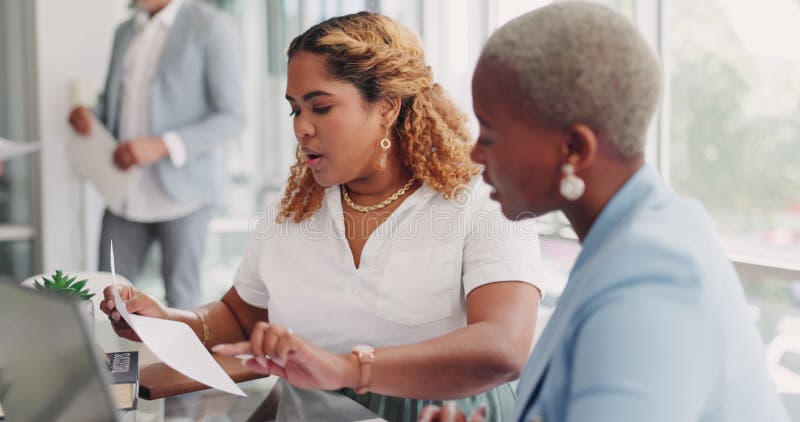 Two Women Review Sales Results or Strategy Using Laptop Stock Footage ...