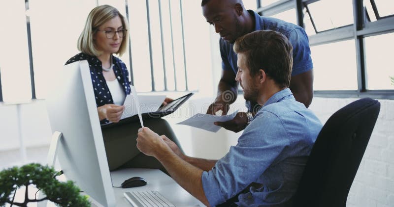 Teamwork, Documents and Review with Business People at Computer for ...