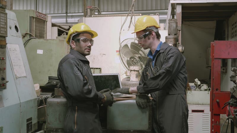 Teamwork Engineer Working and Talking with Friends in Factory ...