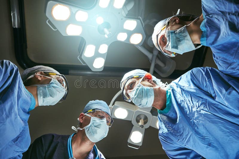 Teamwork is Essential for a Successful Surgery. Low Angle Shot of ...