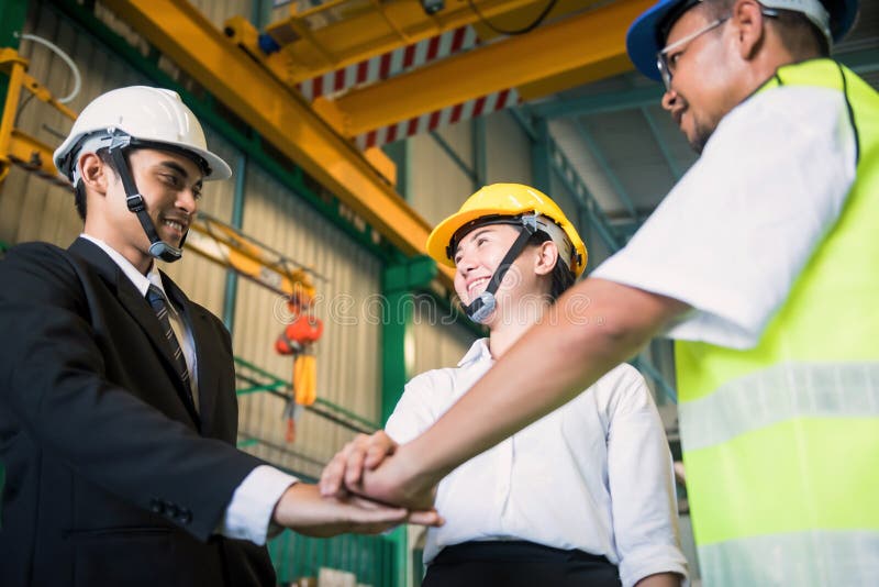 Teamwork in Factory. Stack Hands Stock Photo - Image of businessman ...