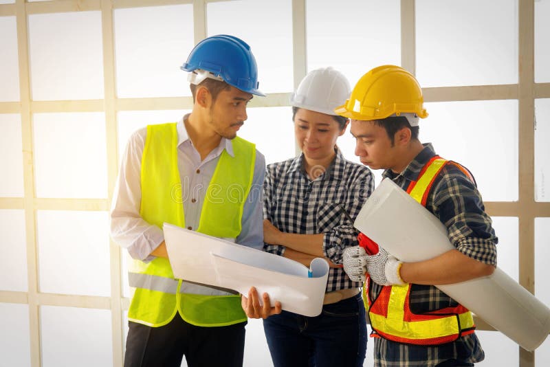 Group of Engineers Working Team Smart Standing Engineer Worker Stock ...