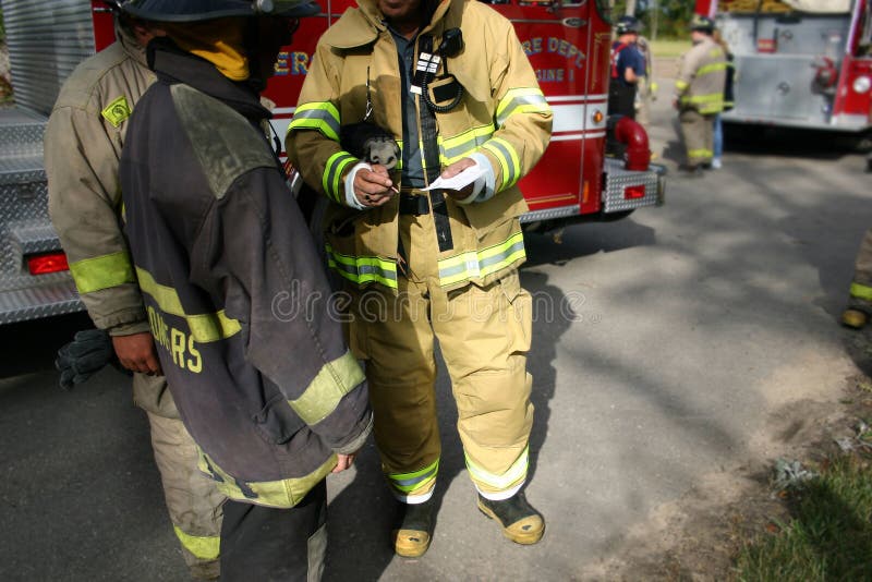 Teamwork (firefighters) stock photo. Image of firemen, discussion - 65228