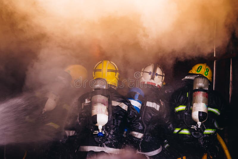 Teamwork of Firefighters Training Stock Image - Image of danger ...