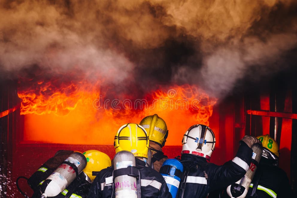 Teamwork of Firefighters Training Stock Image - Image of flame ...