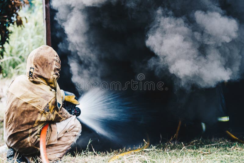 Teamwork of Firefighters Training Stock Photo - Image of extinguish ...