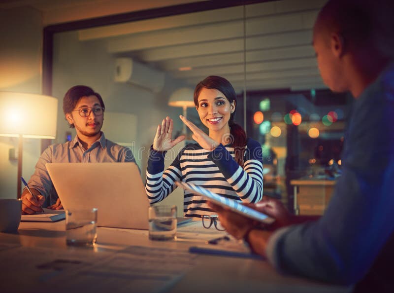 Teamwork Gets Us through the Night Shift with Ease. a Group of ...