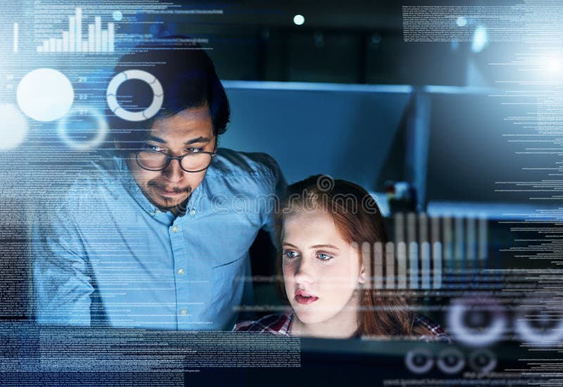 Teamwork Goes a Long Way in the Company. Shot of Two Focussed Young ...