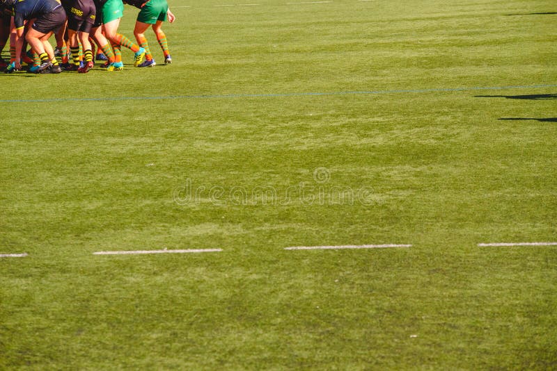 Teamwork of a Group of Rugby Players Pushed Together in the Same ... Teamwork of a Group of Rugby Players Pushed Together in the Same ...