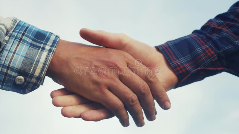 Teamwork Handshake Concept. Two People Shake Hands Shaking Hands ...