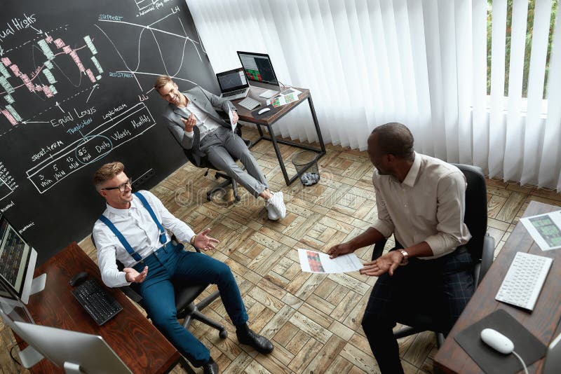 Full Concentration. Back View of Young Male Trader in a Wheelchair ...