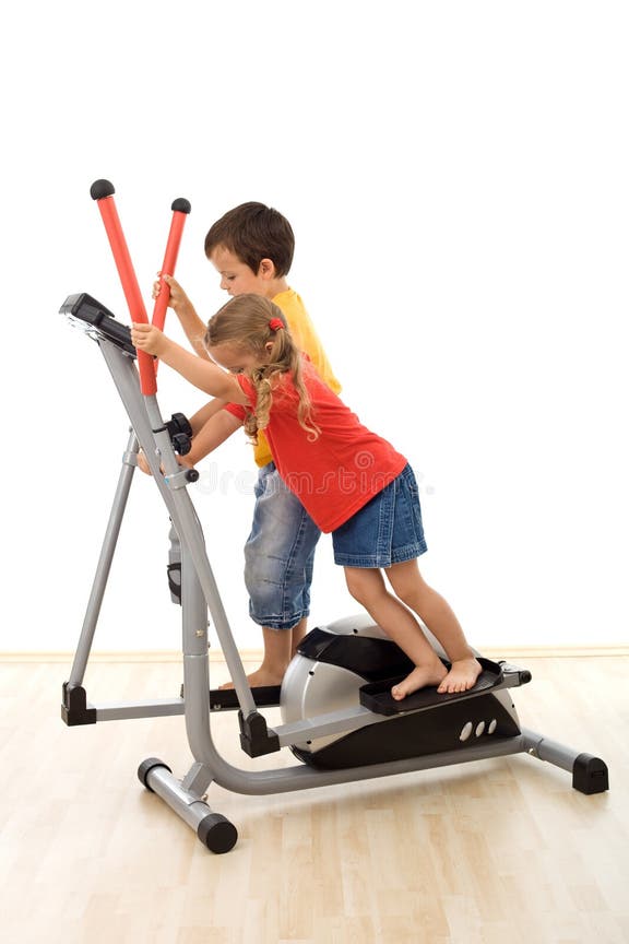Teamwork - Kids Playing on Elliptical Trainer Stock Image - Image of ...