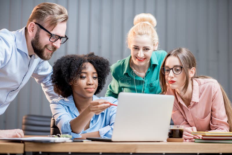 Teamwork with laptop stock image. Image of corporate - 92235335