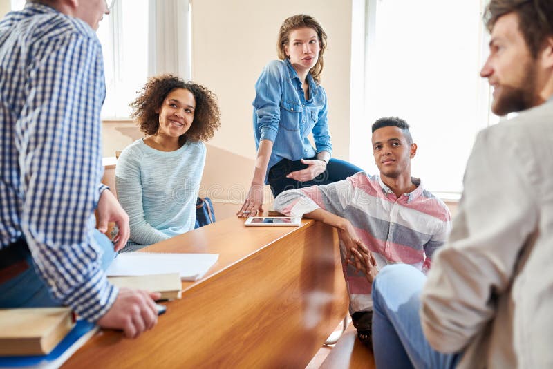 Teamwork at lesson stock image. Image of young, adult - 118091975