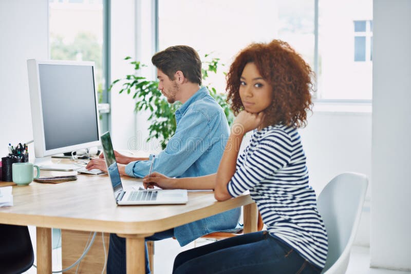 Teamwork Makes the Dream Work. Two Coworkers Working Together at Their ...