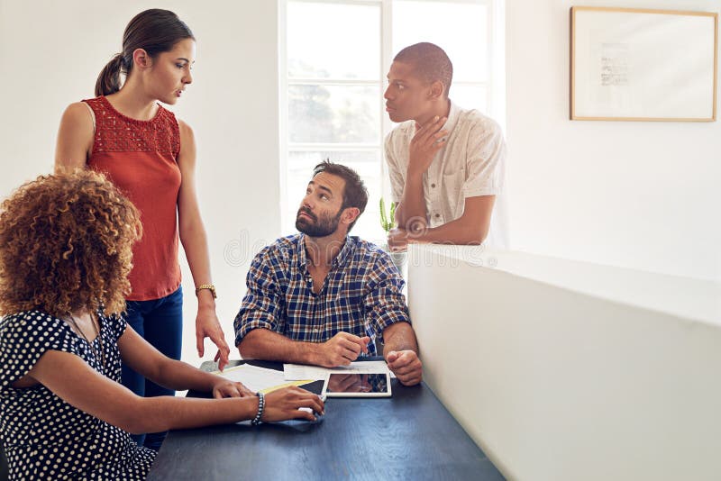 Teamwork Makes Everything Possible. a Group of Colleagues Working ...